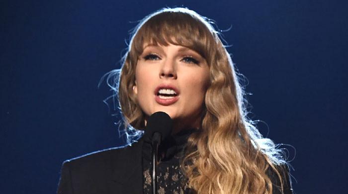 Taylor Swift styles herself in beau Joe Alwyn's jacket after 2023 Grammys