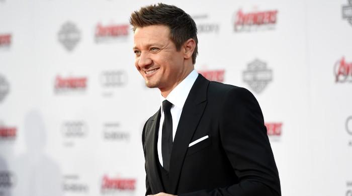 Jeremy Renner joins family on amusement park trip, rides a motorized ...