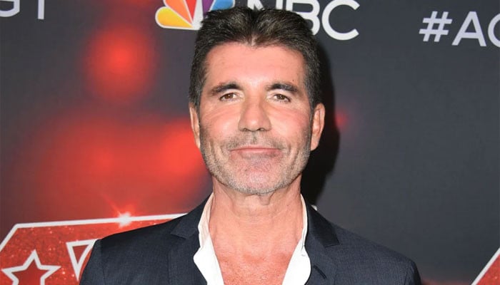 Simon Cowell quits smoking after having puffed up to 40 cigarettes a ...
