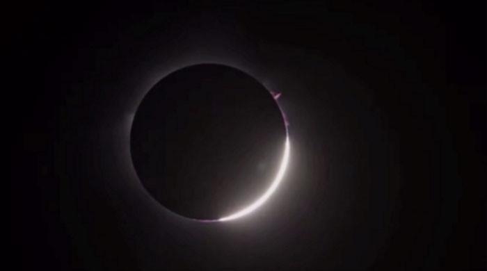 Thousands flock to remote Australian town to witness rare 'Hybrid solar ...