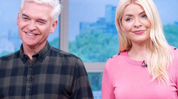 ‘This Morning’ hosts Phillip and Holly flash tense smiles amid feud rumors