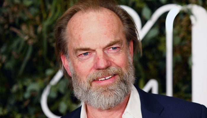 'Matrix' star Hugo Weaving seen with wife in rare London appearance