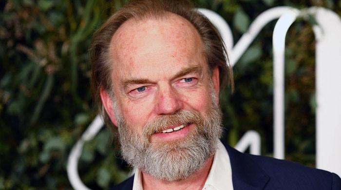 'Matrix' star Hugo Weaving seen with wife in rare London appearance