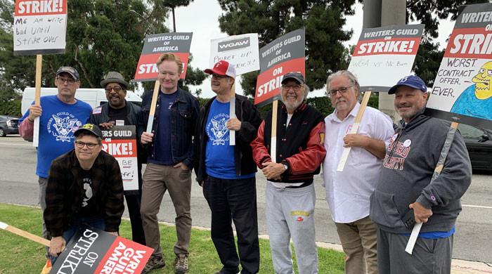 'The Simpsons' team hits picket line in solidarity with writers