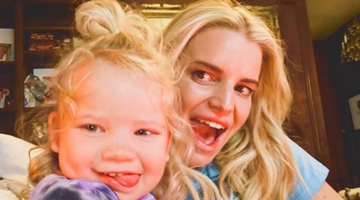 Jessica Simpson's captures daughter Birdie cuddling with family dog