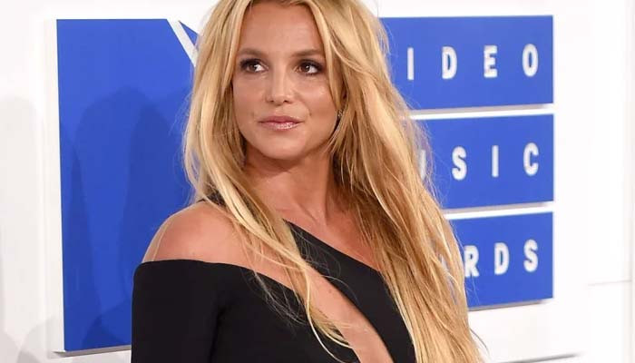Britney Spears Stuns In Yellow Bikini While Relaxing At Beach