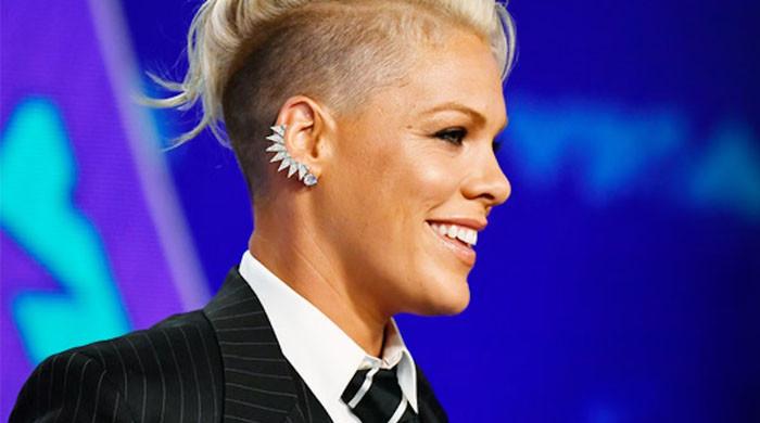 Pink stuns in swimsuit as she takes ice bath backstage