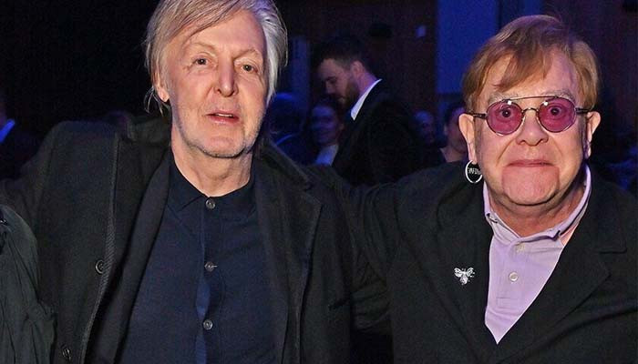 Paul McCartney looks awed while watching Elton John at Glastonbury