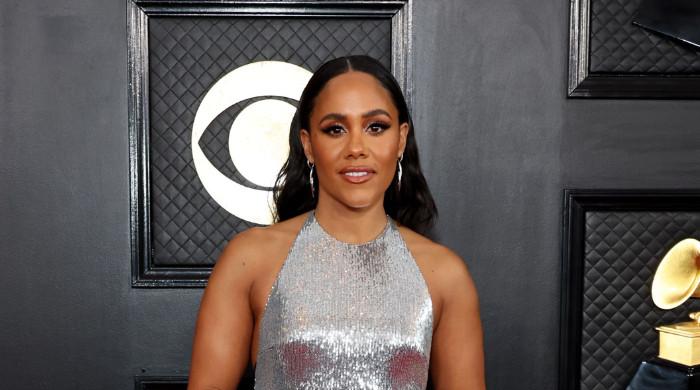 Alex Scott flaunts toned figure in trendy outfit at exclusive London club