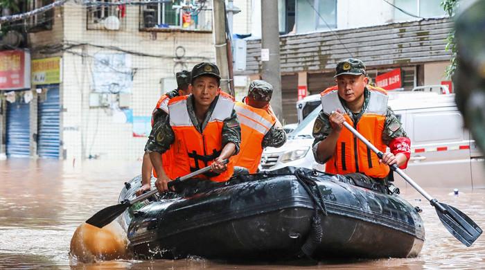 Heavy rains, severe flooding kills 15 in China, causing thousands to flee