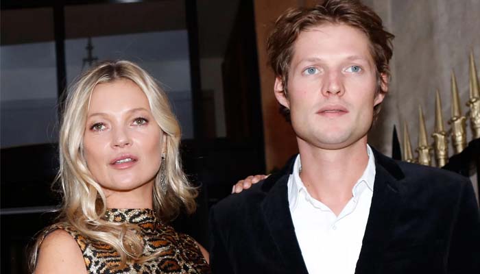 Kate Moss’ beau arrives at hotel with Camille Rowe in tow