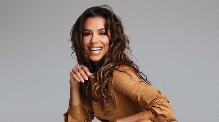 Eva Longoria stuns in hot pink mini dress