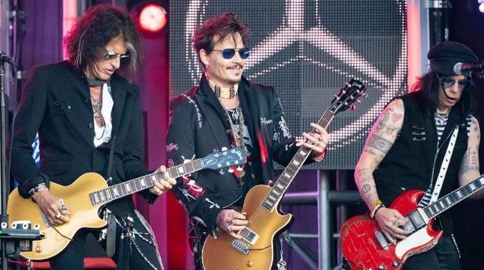Johnny Depp mesmerises fans with pleasant presence as he performs with ...