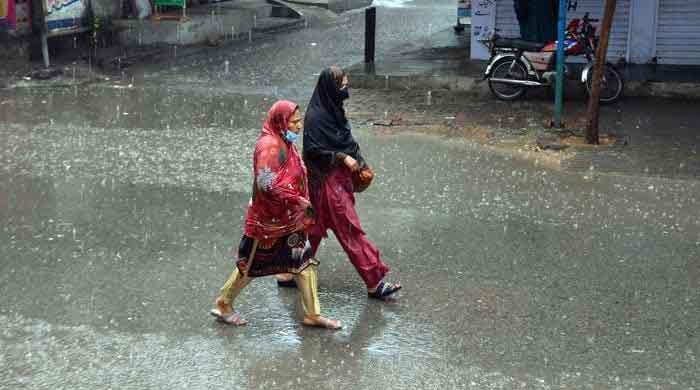 Weather turns pleasant as parts of Karachi receive rain with strong winds