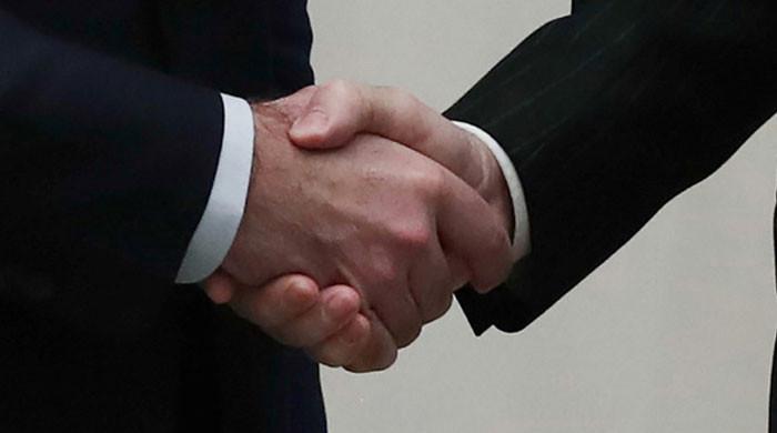 Biden shakes hands with Stalin at G20 summit in 'historic' encounter