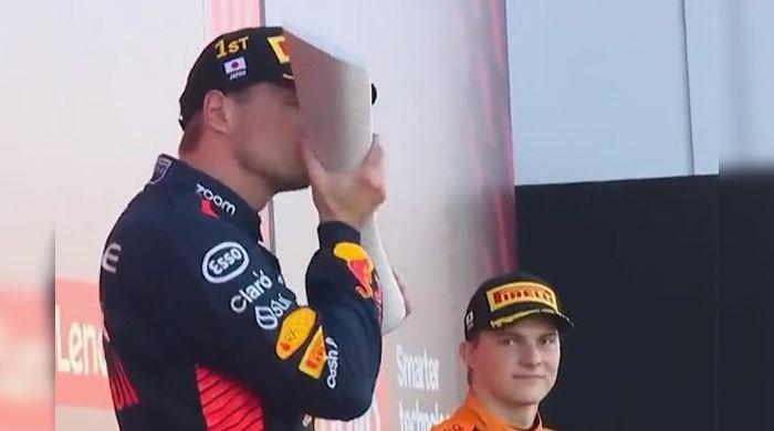 WATCH: Max Verstappen gets first-ever 'kiss-activated' trophy after ...