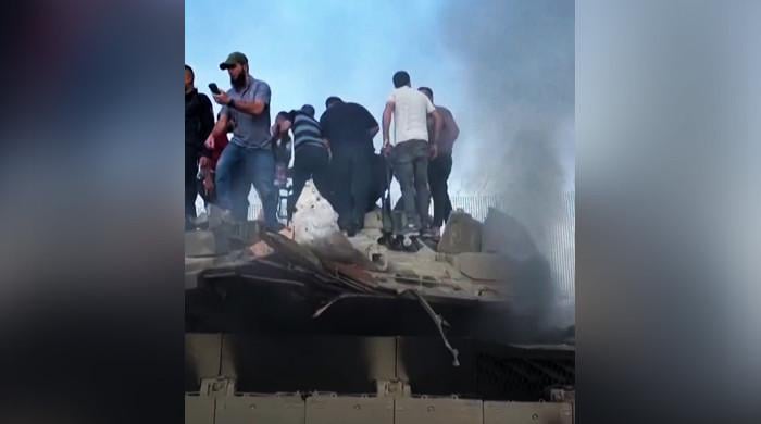 WATCH: Palestinians celebrate on top of 'destroyed Israeli tank'