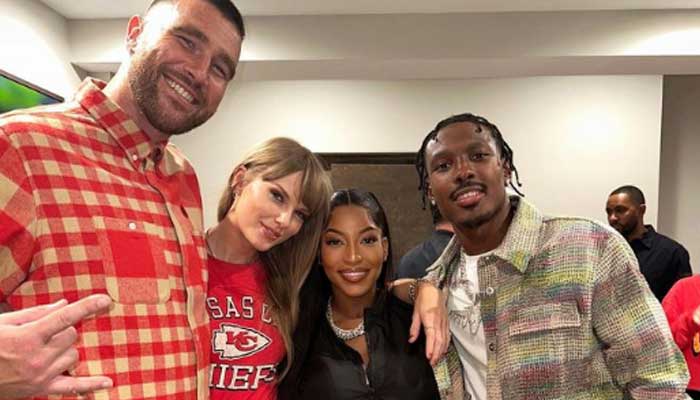 Taylor Swift seen kissing Travis Kelce in new photo