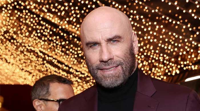 John Travolta pays tribute to Bill Kenwright