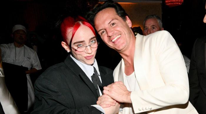 Billie Eilish dances with Andrew Scott during Golden Globe win celebration