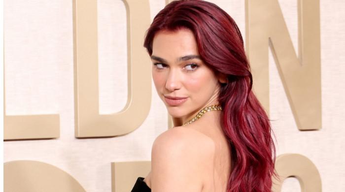 Dua Lipa reveals the secret behind her iconic red hair