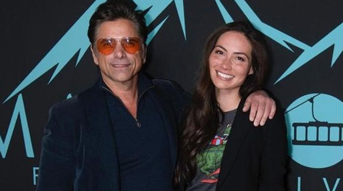 John Stamos lauds wife Caitlin 'Invisible Raptor' movie premiere