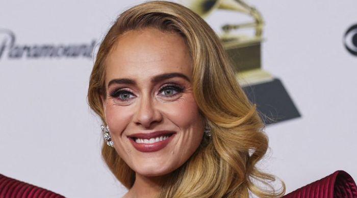 Adele is 'happy' with her life as she celebrates 36th birthday