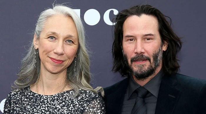 Keanu Reeves and girlfriend all smiles after romantic date night