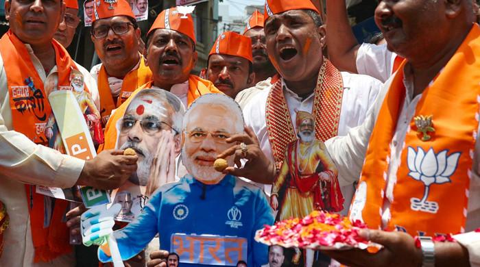 India vote count shows Modi alliance heading to majority but no landslide