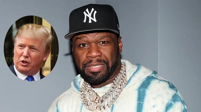 50 Cent tips Donald Trump's hat on album cover while performing in Boston