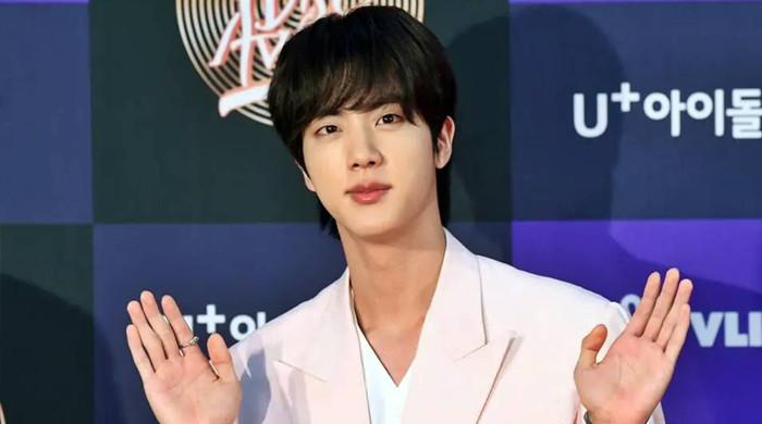 BTS Jin symbolizes 'harmony' as torchbearer of the Paris Olympics 2024
