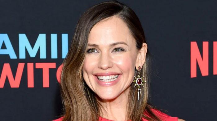 Jennifer Garner goes glam in red dress at ‘Deadpool & Wolverine' panel