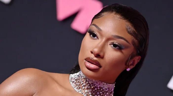Megan Thee Stallion embraces Halloween season in spooky-themed attire