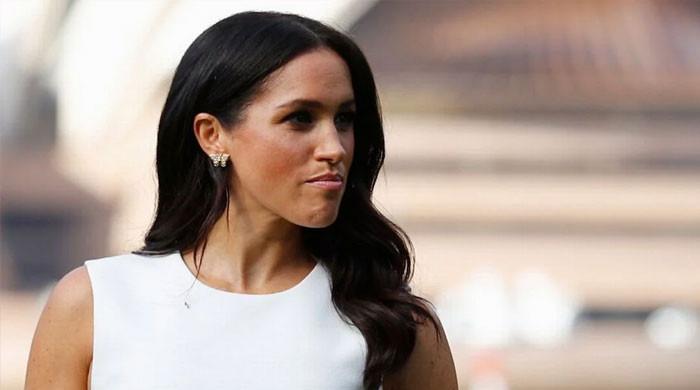 Meghan Markle looking ‘strange' without 'death grip' on Prince Harry
