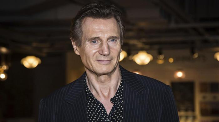 Liam Neeson reveals how he strives to be 'a good example' for his sons