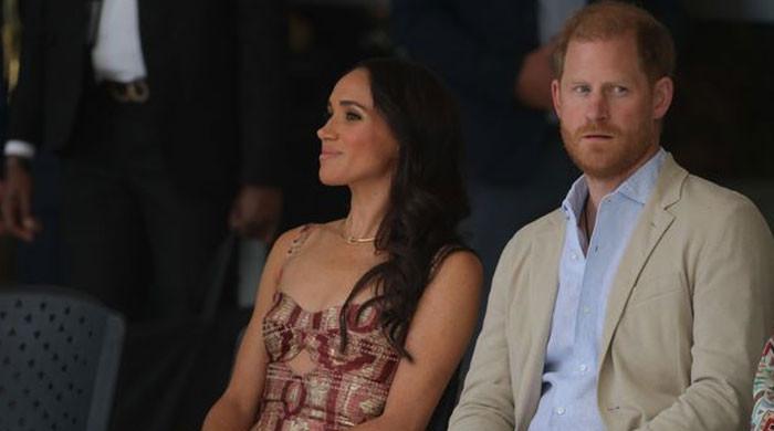 Meghan Markle trying to pry Prince Harry away from Buckingham Palace