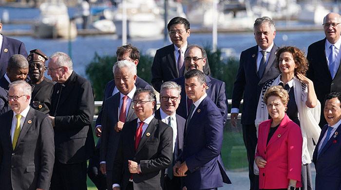 G20 leaders turn focus to climate change on Rio summit's last day