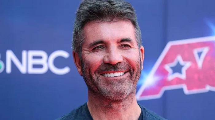 Simon Cowell shares playful swimming moment with son Eric