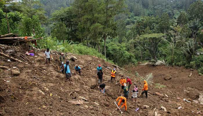Indonesia rescuers search for survivors as landslide kills 19