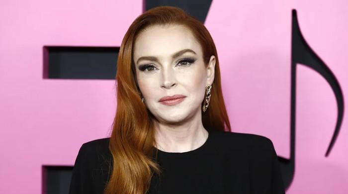 Lindsay Lohan breaks social media cover post dad's arrest