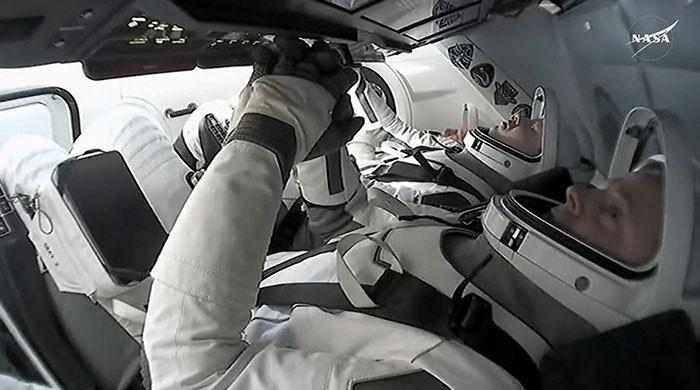 Nasa astronauts return after nine-month space stay