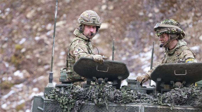 Prince William arrives on Challenger tank