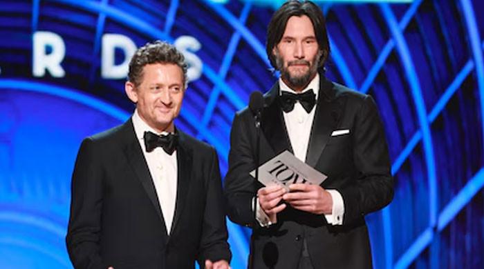 Jonathan Groff straddles Keanu Reeves mid-performance at 2025 Tony Awards