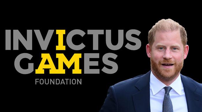 Members of Prince Harry's Invictus Games Foundation pay a tribute to the fallen