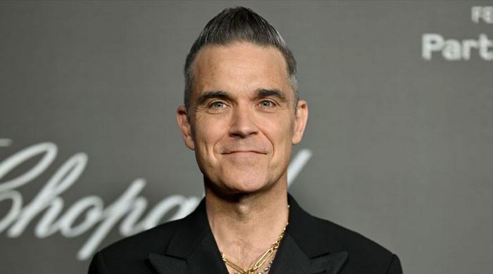 Robbie Williams announces 2026 ‘long 90s' UK Tour