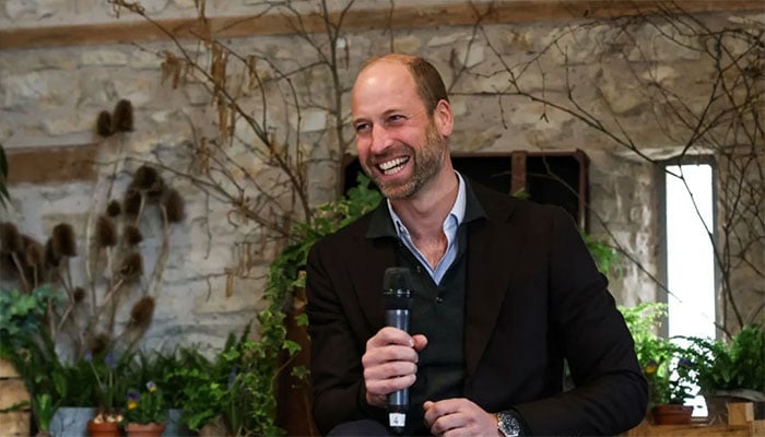 Prince William gets his boots muddy after praising NHS heroes